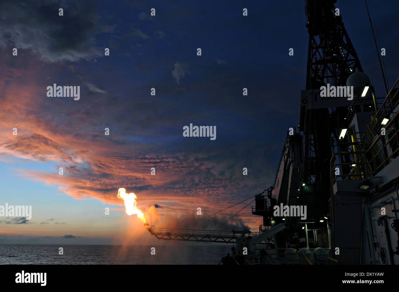 Gas from the damaged Deepwater Horizon oil well is burned off by the ...