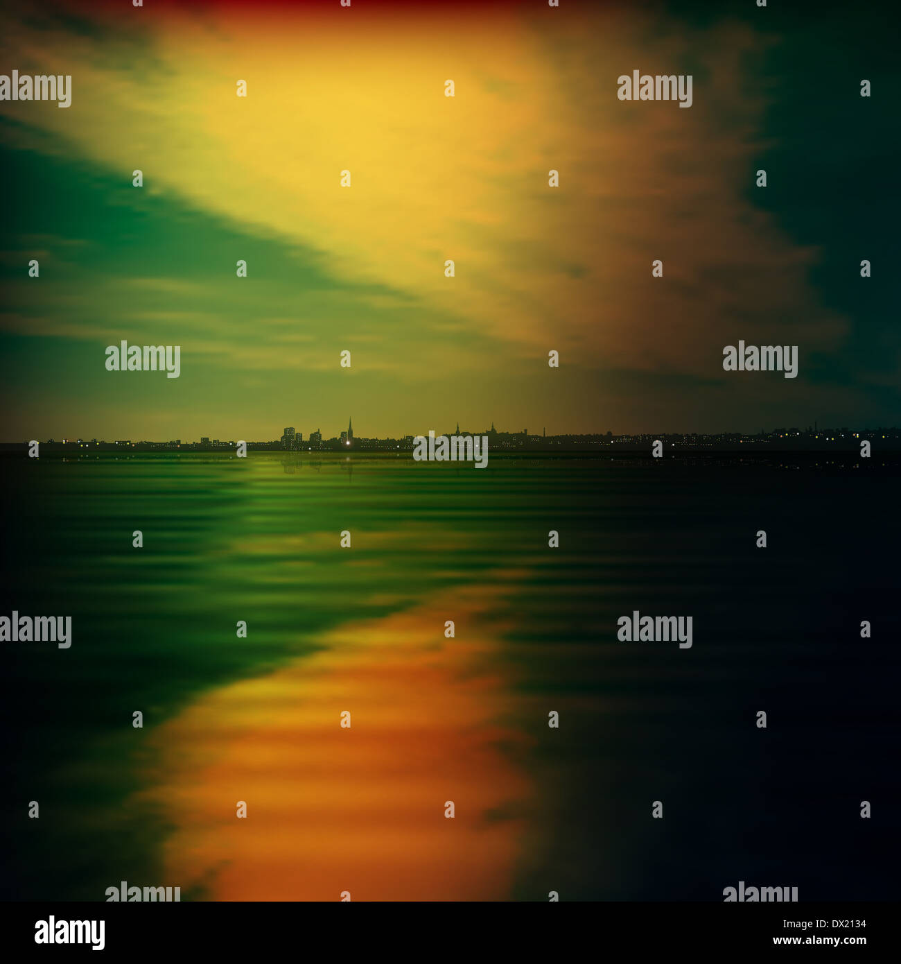 abstract background with silhouette of city and green sunset Stock ...