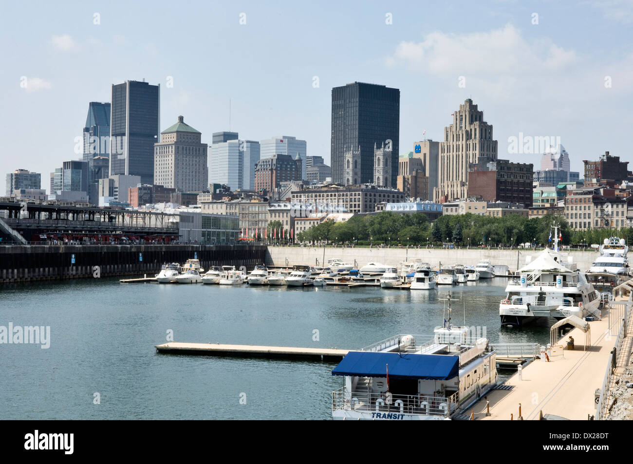 View of downtown Montreal showing the port on the St. Lawrence River ...