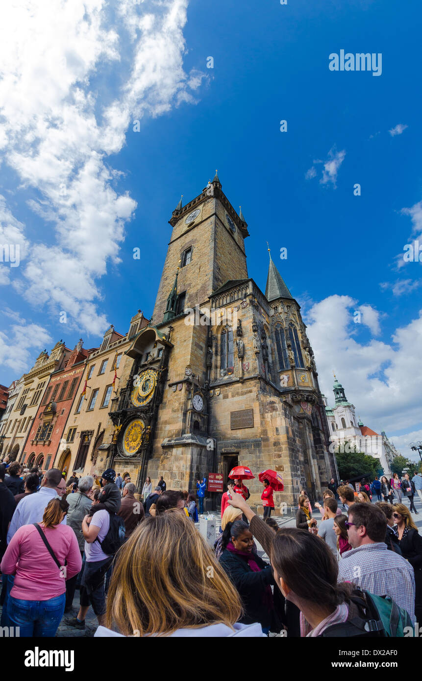 Tourists admire the clock tower in Prague, Czech Republic Stock Photo ...