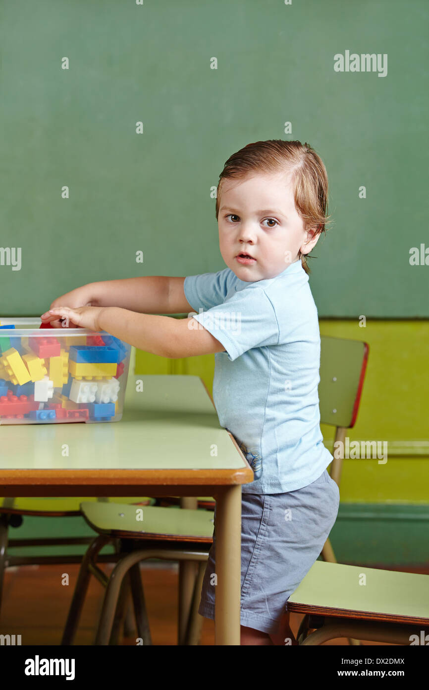 Child helping child get up hi-res stock photography and images - Alamy