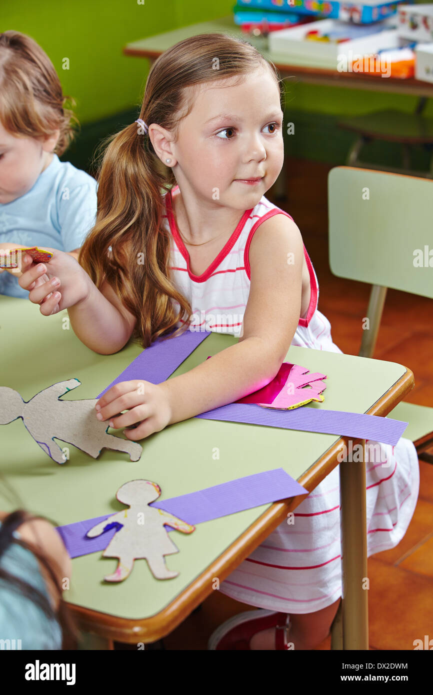 Happy kids doing arts and crafts hi-res stock photography and images ...