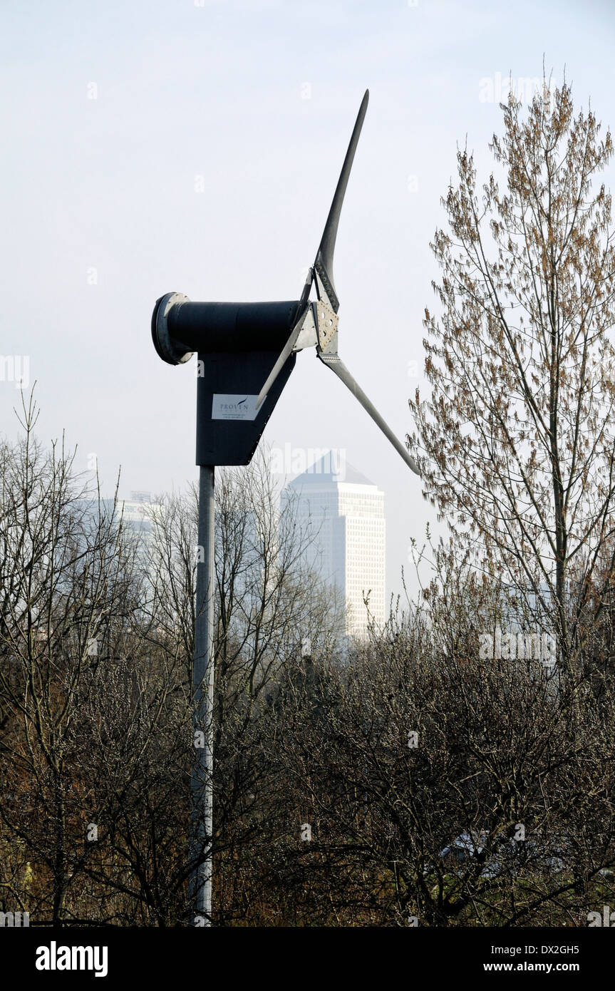 Urban wind turbine, Mile End Park with Canary Wharf behind, London ...