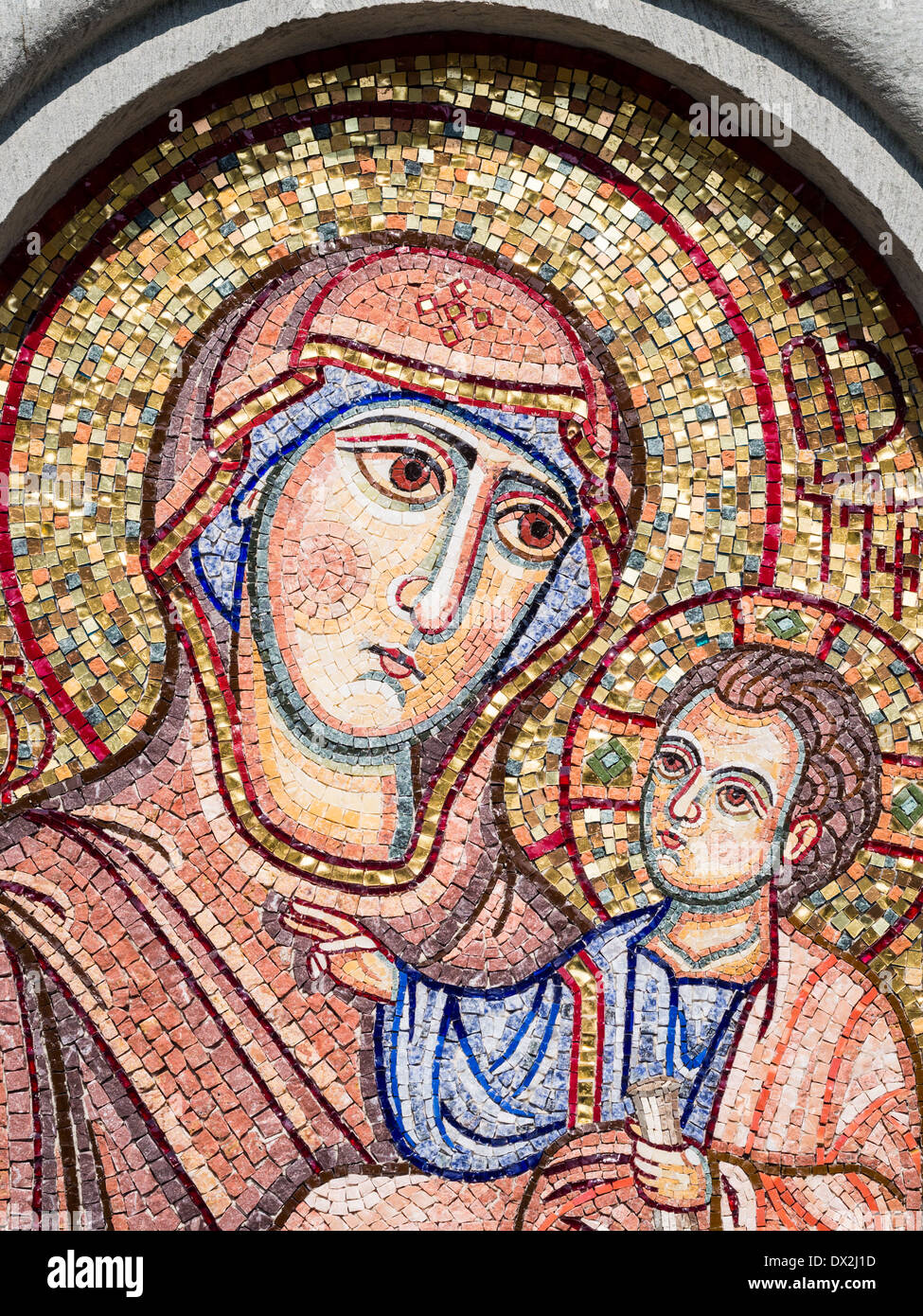 Virgin Mary holding the Christ child. Mosaic outside of the Metekhi ...