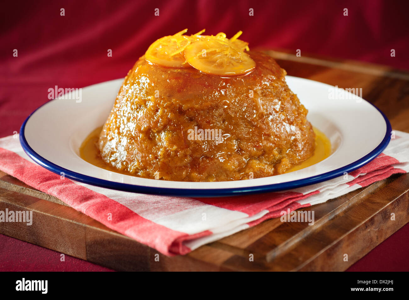 Steamed orange marmalade pudding. Traditional dessert UK Stock Photo ...