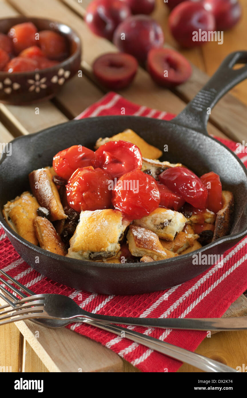 Kaiserschmarren. Shredded pancake dessert with plum compote Stock Photo ...