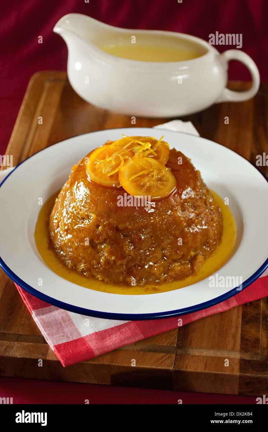 Steamed orange marmalade pudding. Traditional dessert UK Stock Photo ...