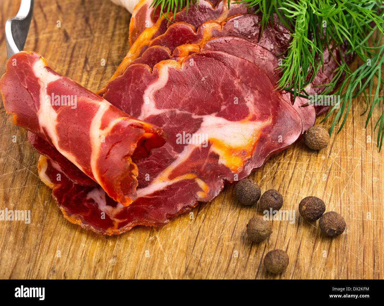 simple farm bacon, stranded on a fork . Focus area increased by folding ...