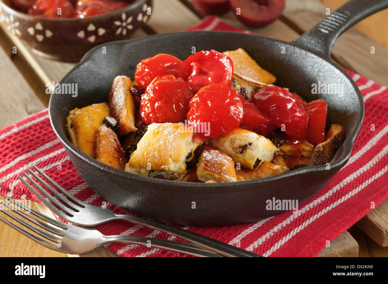 Kaiserschmarren. Shredded pancake dessert with plum compote Stock Photo ...