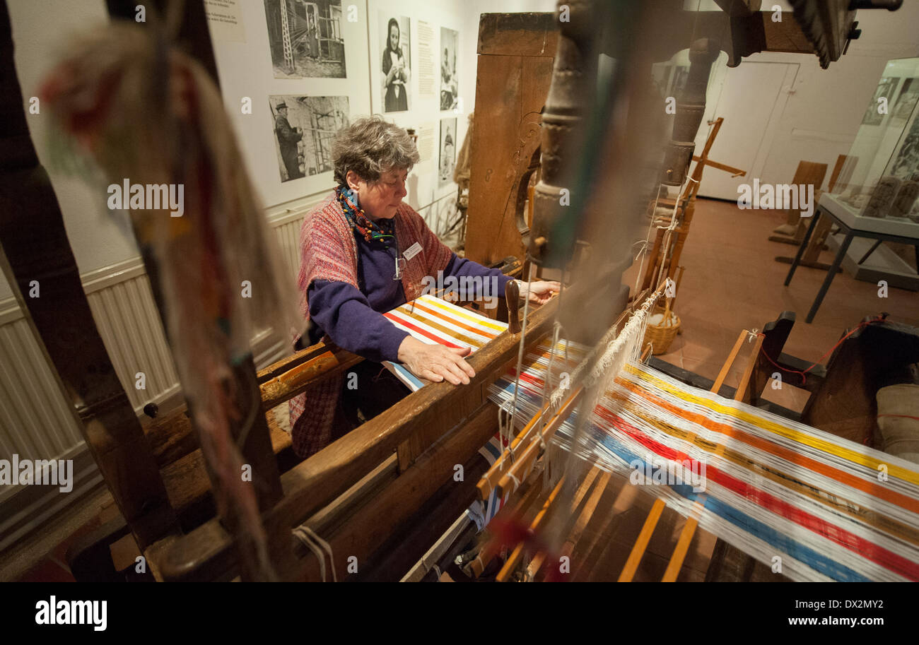 Weaver Uschi Schwierske works at a weaving loom from 1840 in the museum ...