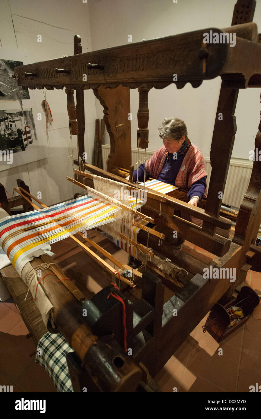 Weaver Uschi Schwierske works at a weaving loom from 1840 in the museum ...