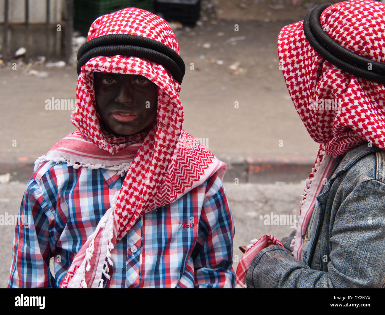 Jerusalem, Israel. 17th Mar, 2014. Young boys dressed up as Arabs roam ...
