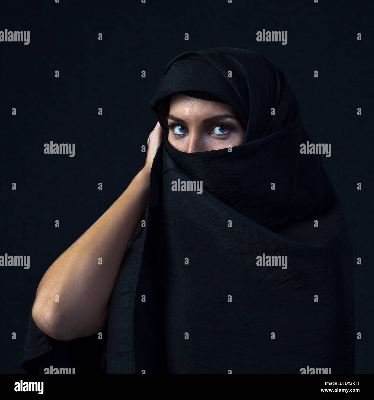 Girl with face covered with veil muslim hi-res stock photography and ...