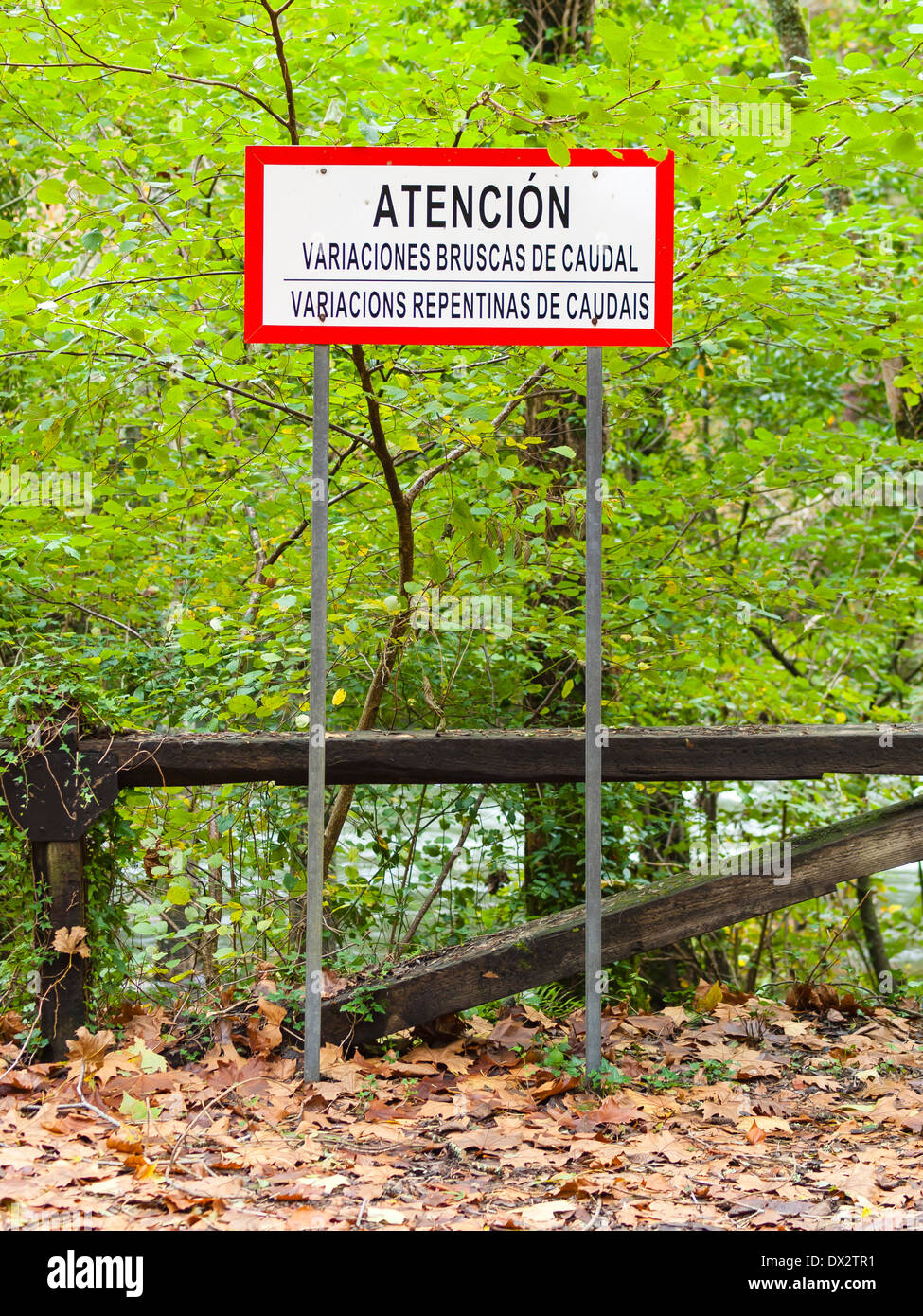 Danger sign in a river in Spain Stock Photo - Alamy