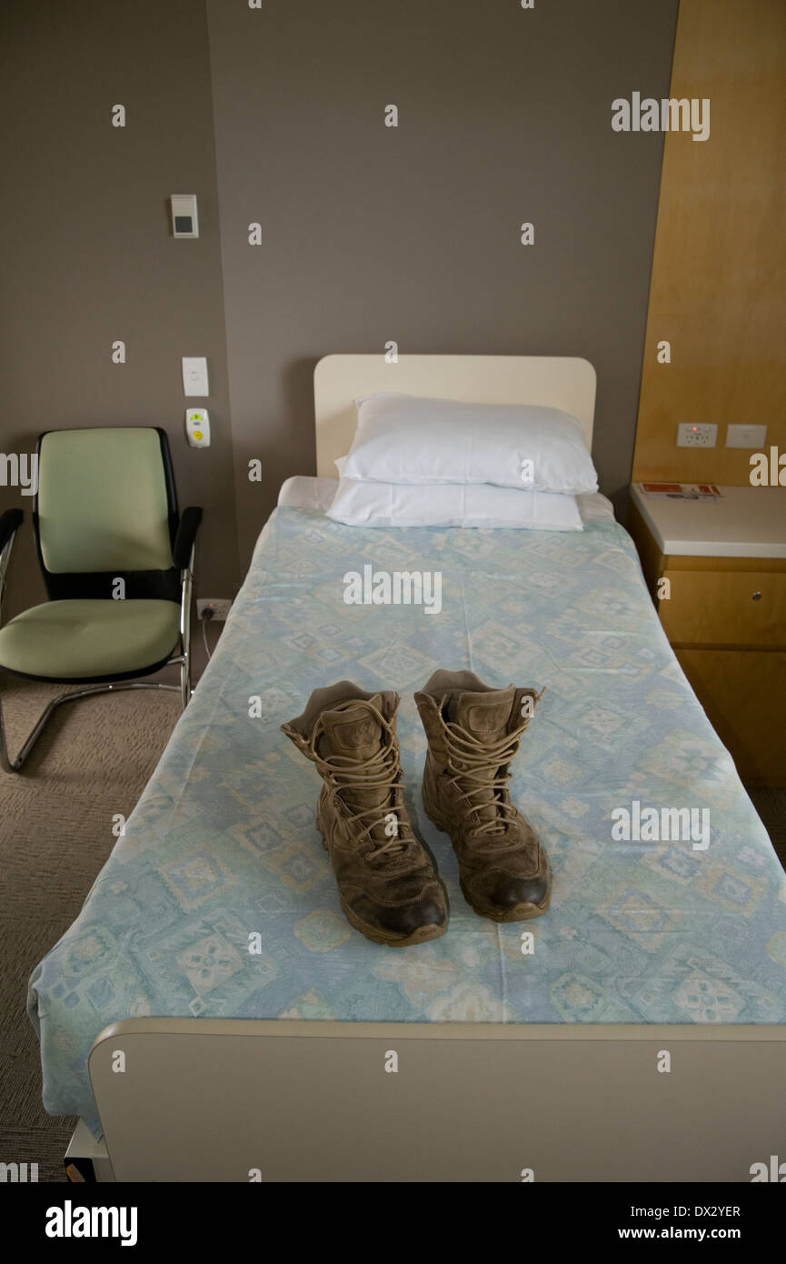 Army boots in hospital ward Stock Photo - Alamy