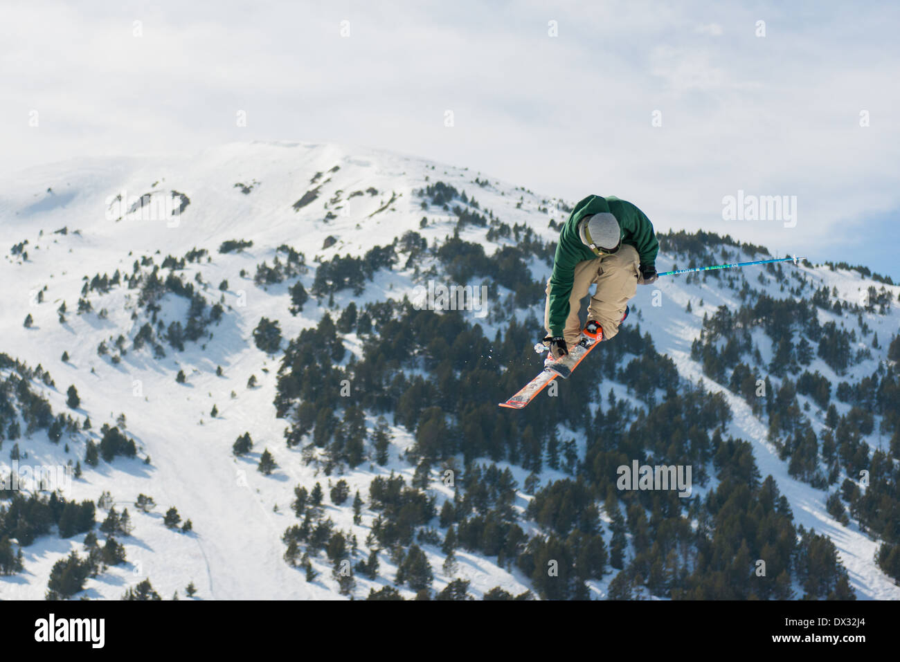 Snowboarder performing trick snow hi-res stock photography and images ...