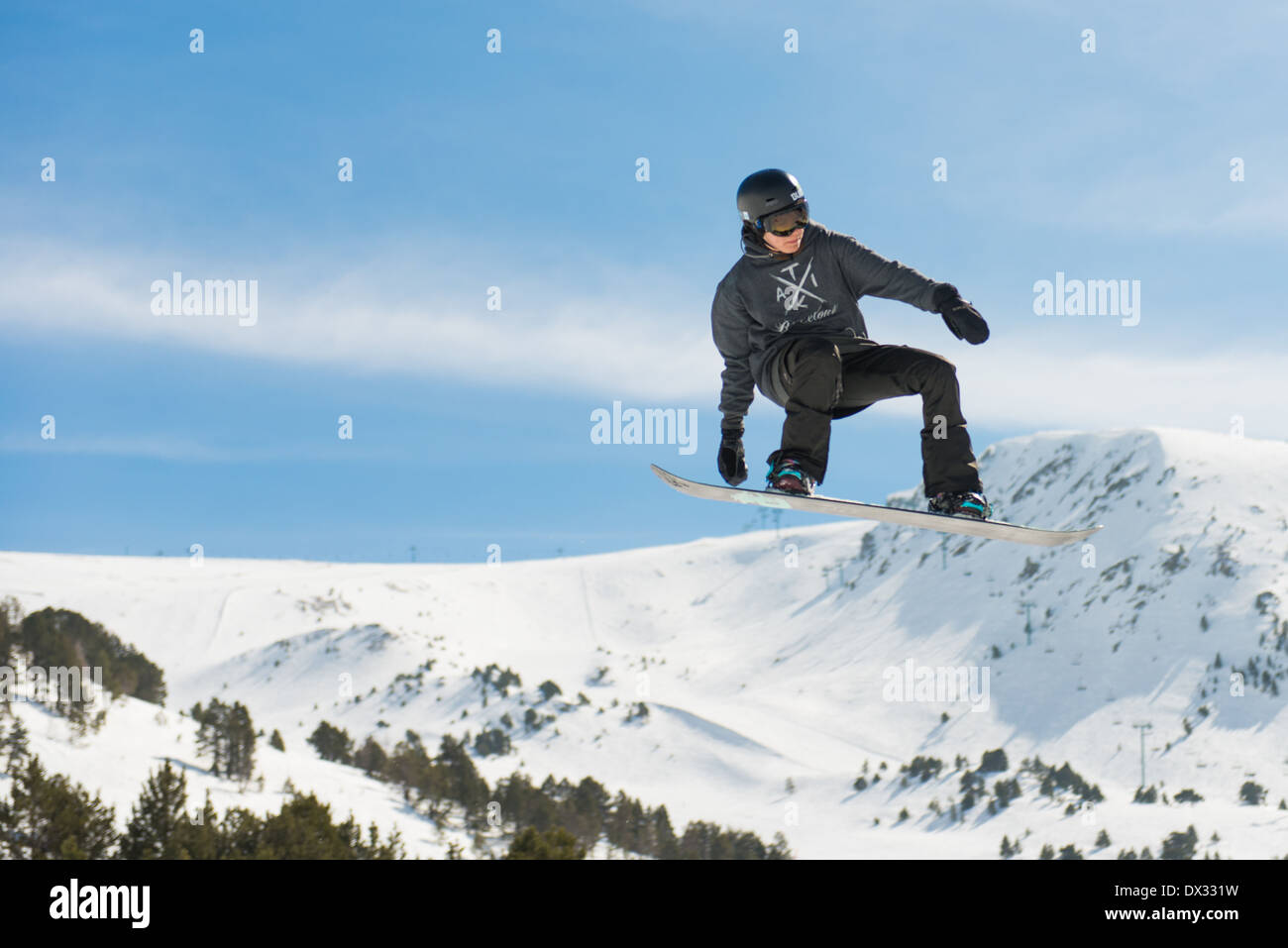 Snowboarder performing trick snow hi-res stock photography and images ...
