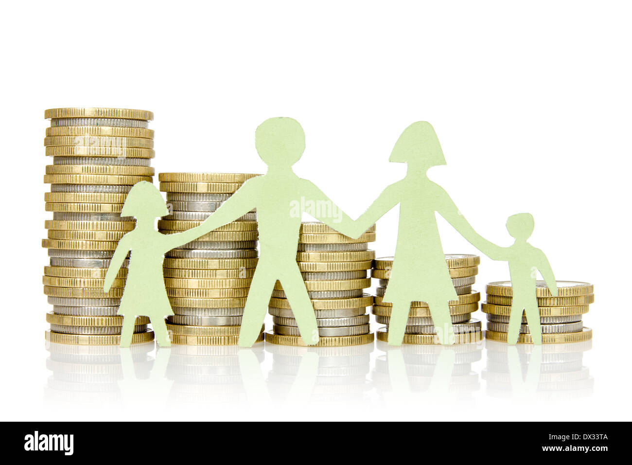 Money concepts. Paper family and stacks of coins on white background ...
