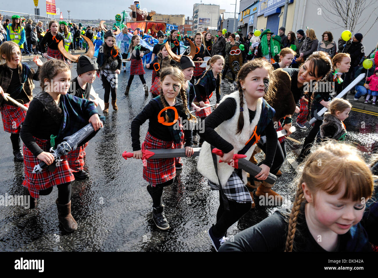 Derry, Londonderry, Northern Ireland – 17 March 2014. Revellers dressed ...