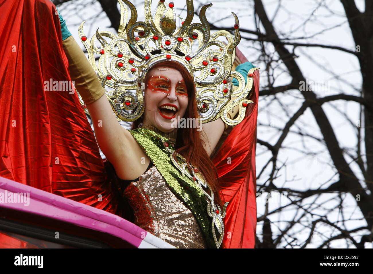 Dublin, Ireland. 17th March 2014. A performer from Spraoi waves at the ...
