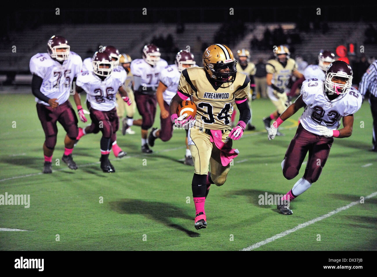 Running football hi-res stock photography and images - Alamy