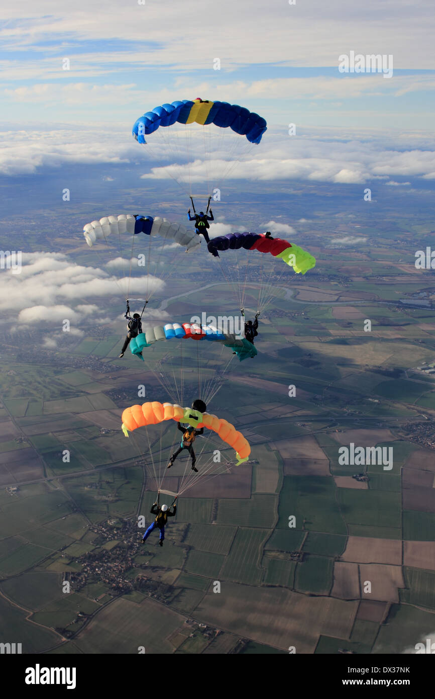 5 Skydivers in a Canopy Formation Stock Photo - Alamy