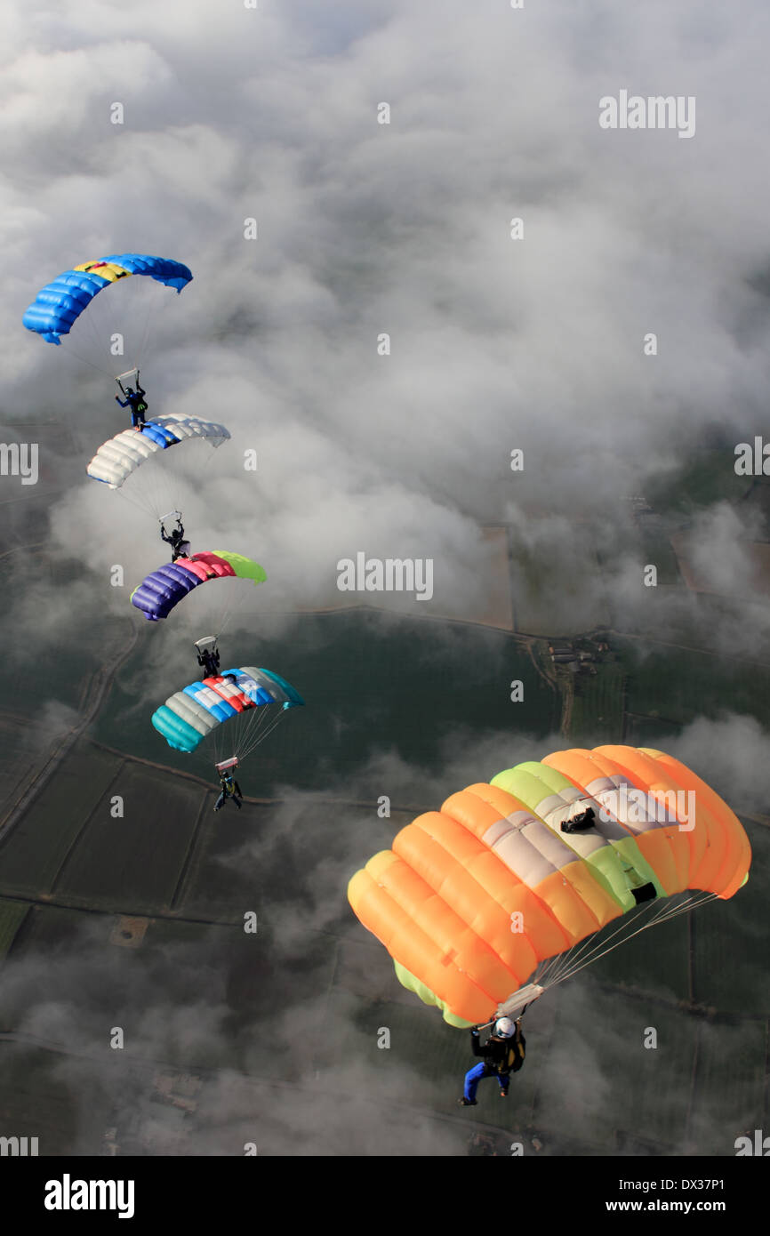 5 Skydivers in a Canopy Formation Stock Photo - Alamy