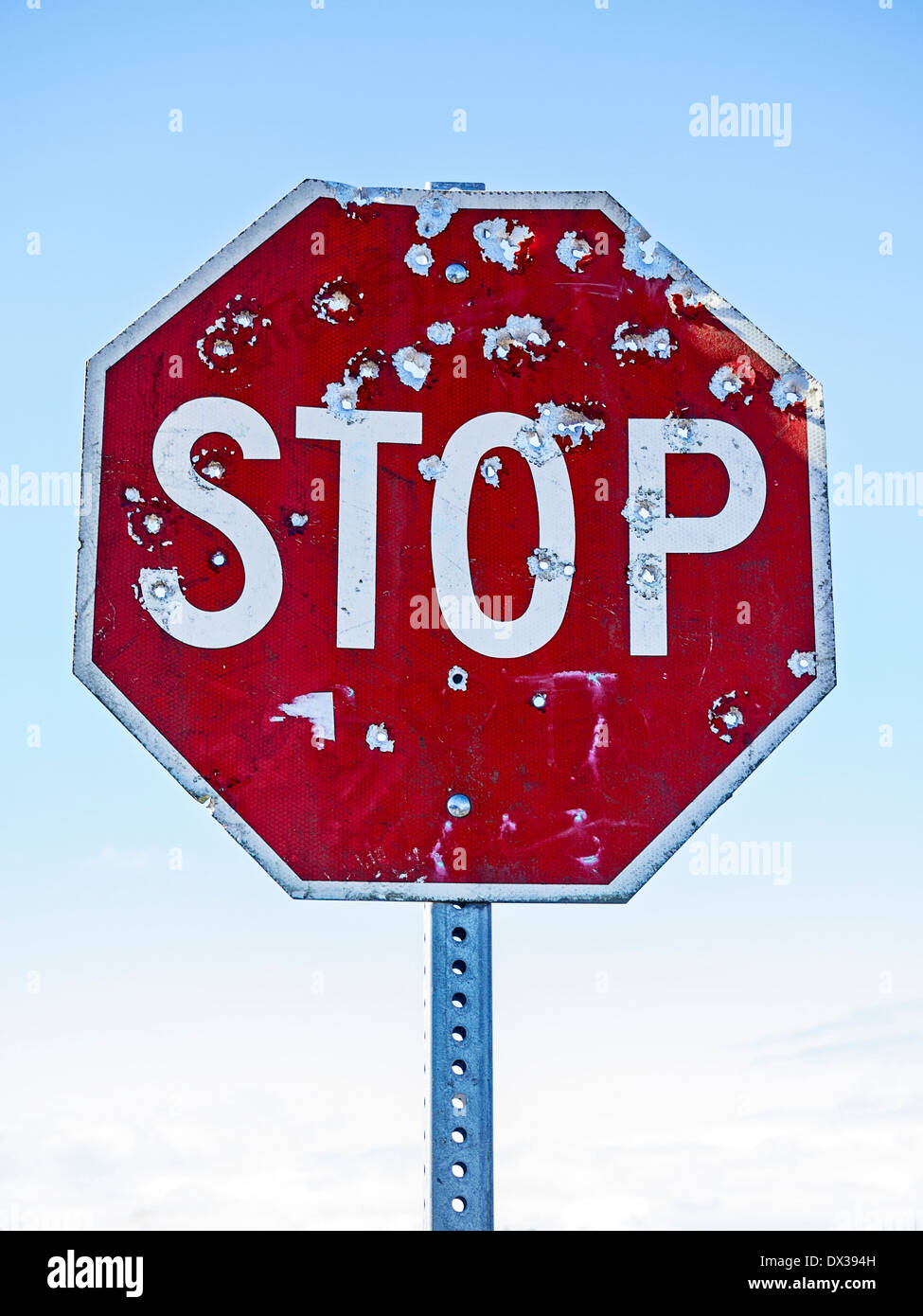 Stop Sign With Bullet Holes Stock Photo - Alamy