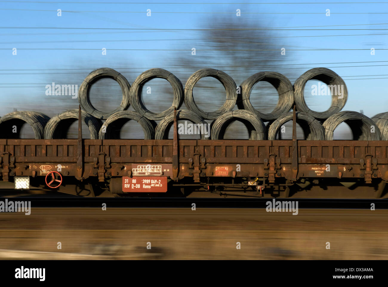 Freight train with steel Stock Photo - Alamy
