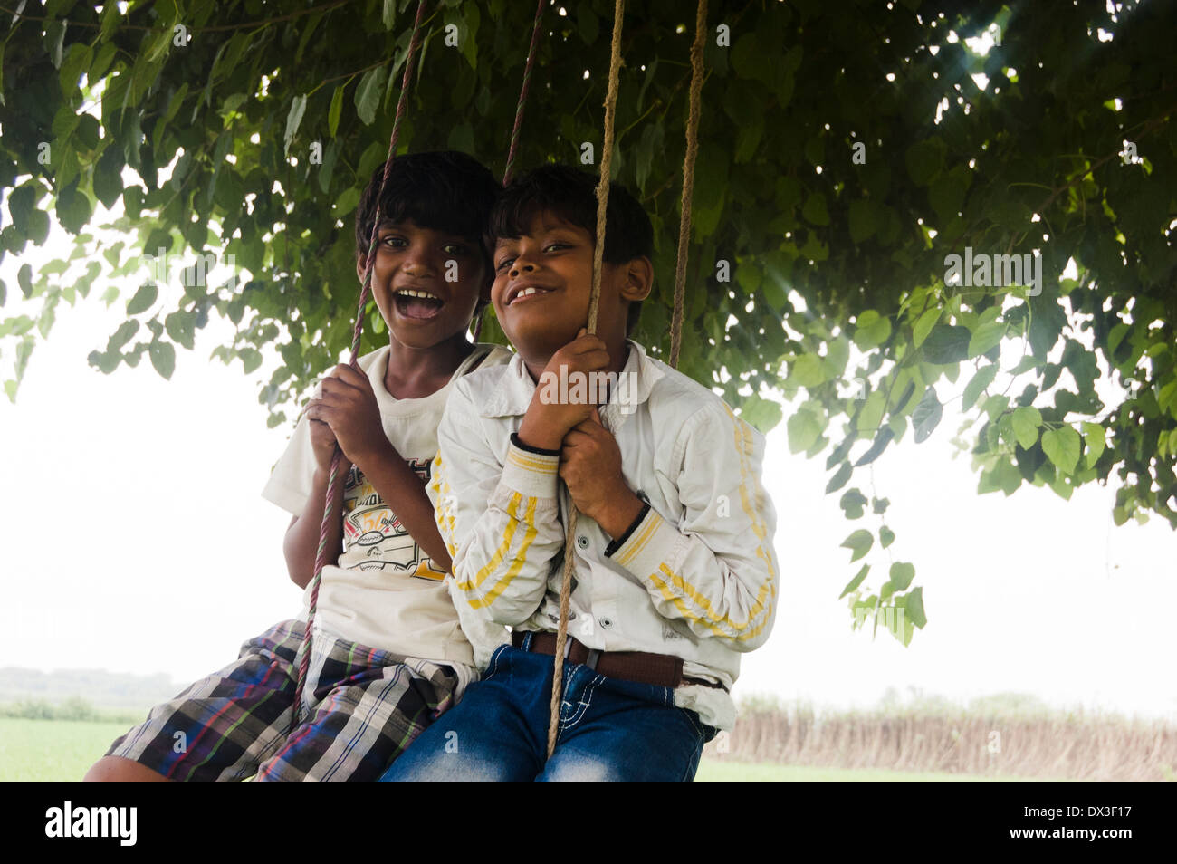 Indian Rural Kids Hanging Stock Photo - Alamy