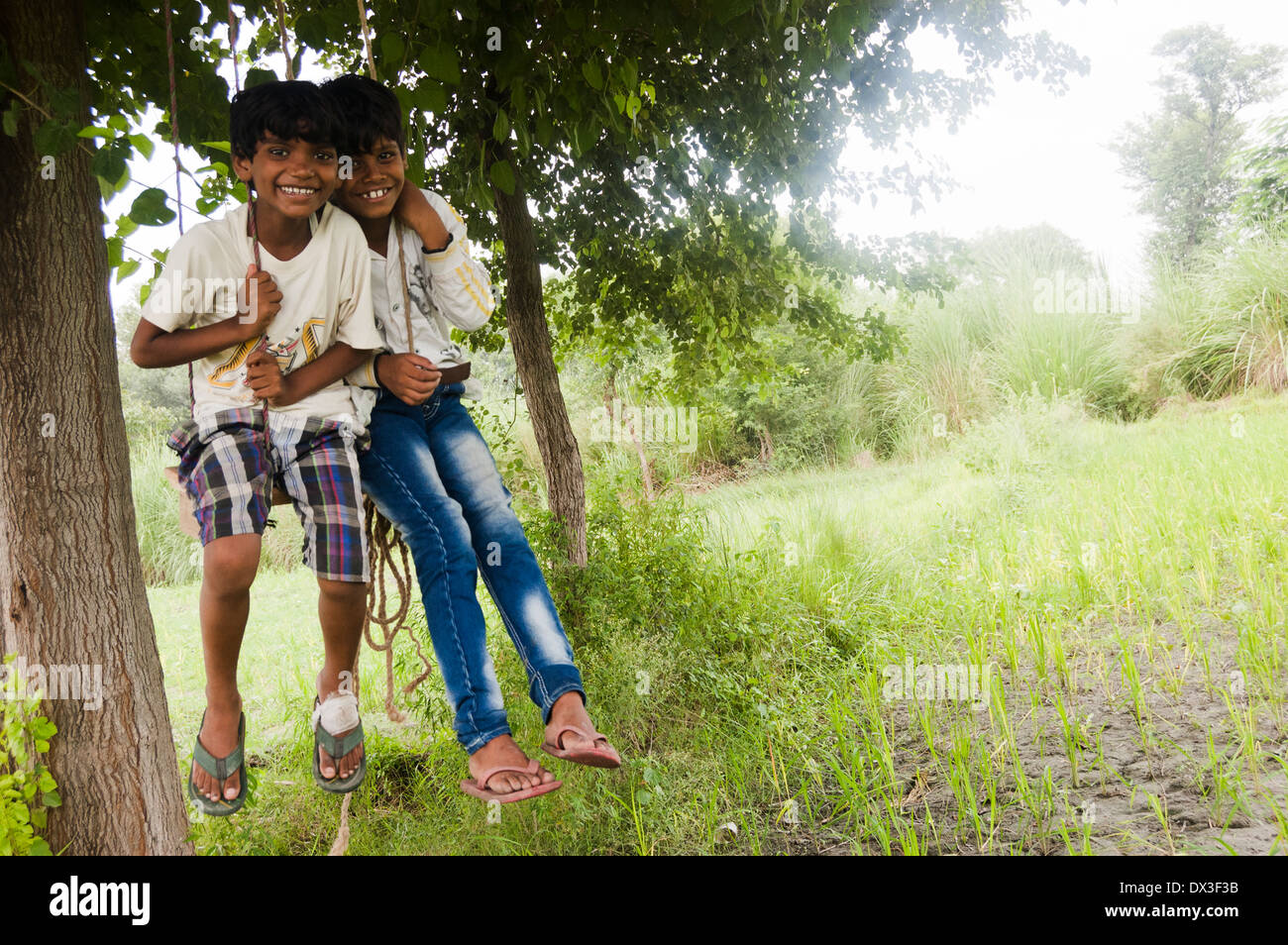 Indian Rural Kids Hanging Stock Photo - Alamy