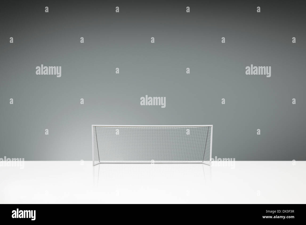 football concept showing empty football goal posts with goal net and ...