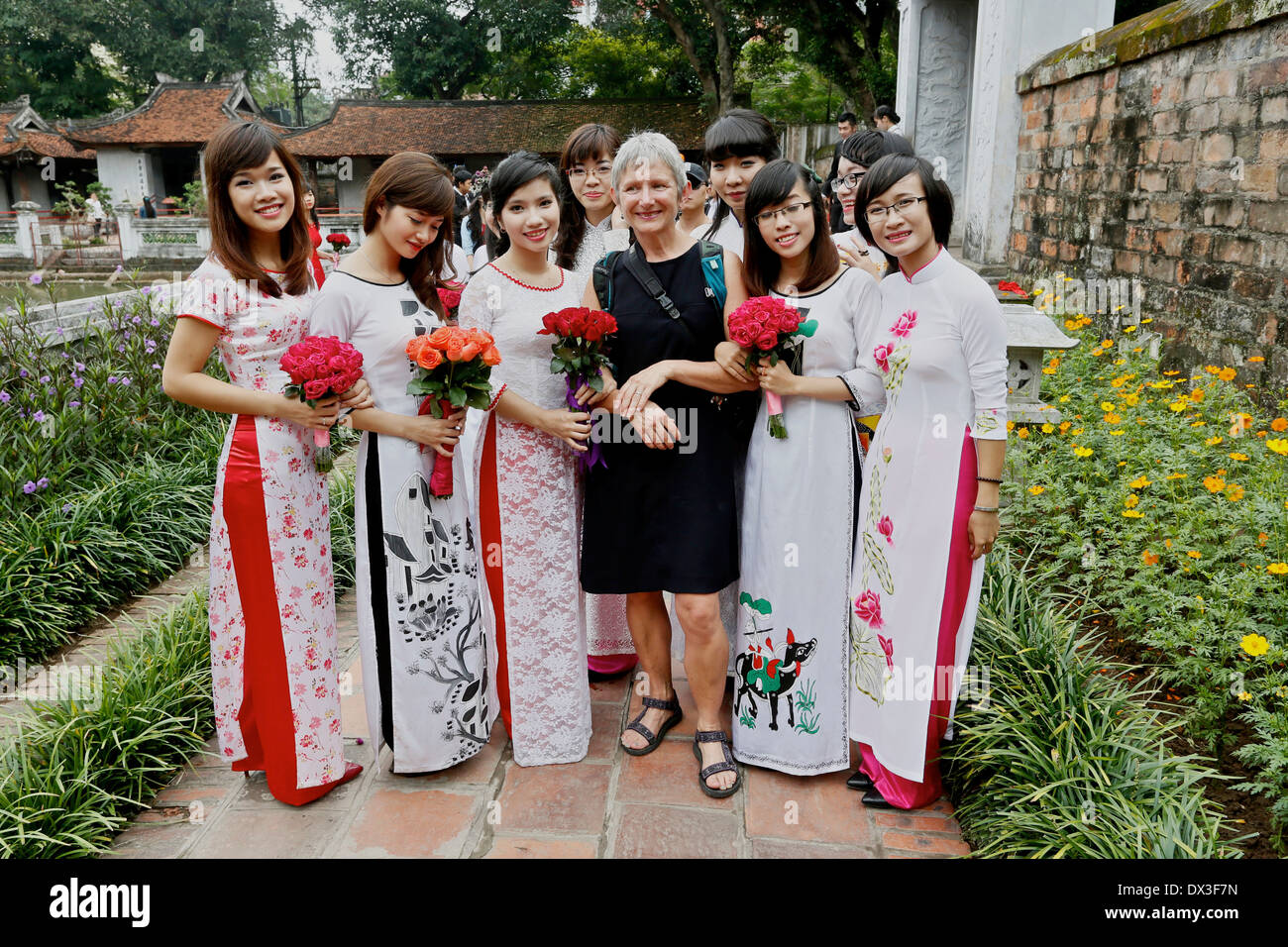 Students graduating from Vietnamese University celebrate at a ceremony ...
