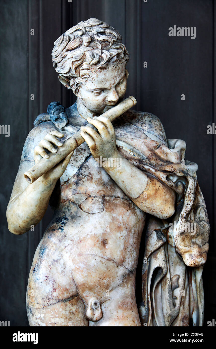 Ancient Roman statue of a young boy with flute Stock Photo - Alamy