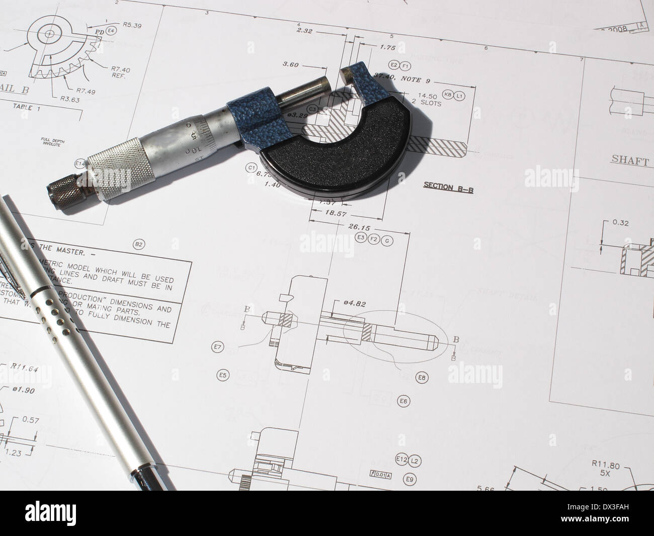 An image showing Pens and a micrometer for precision engineering ...