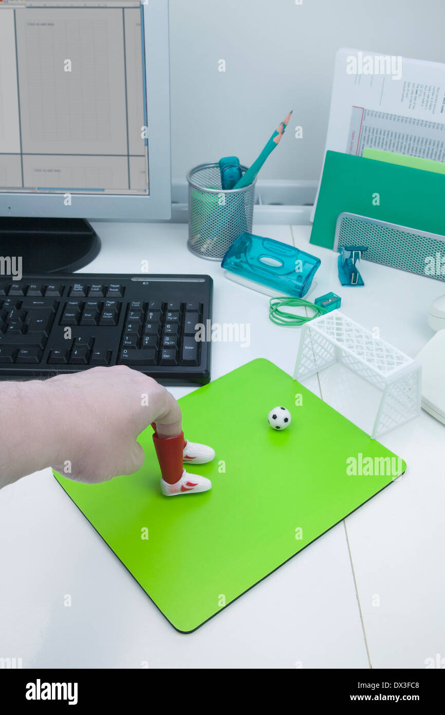 office worker playing Table top Football on a office desk Stock Photo ...