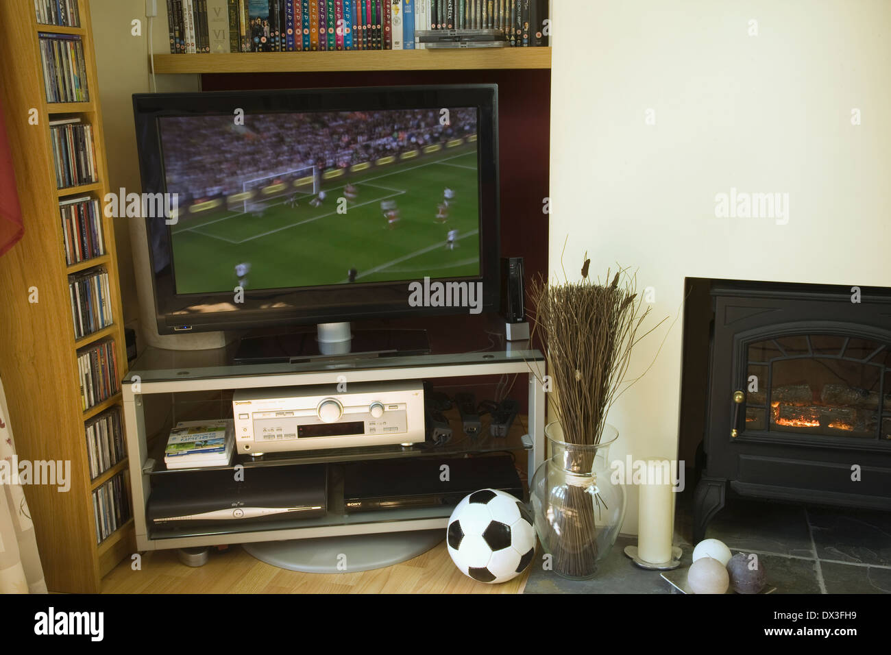 Soccer game on television, in the main living room Stock Photo - Alamy