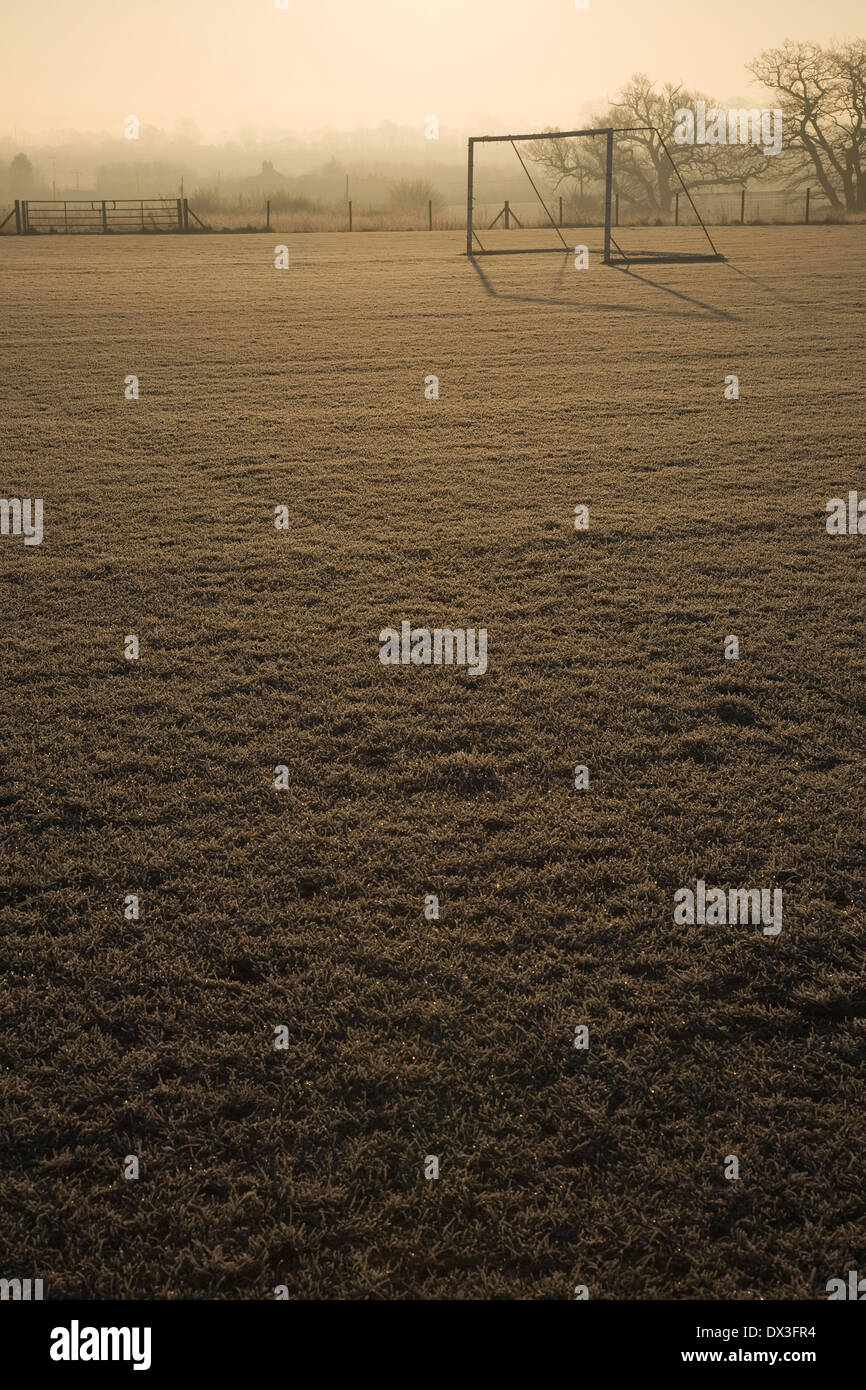 empty football pitch and goal on a frosty winter morning sunrise Stock ...