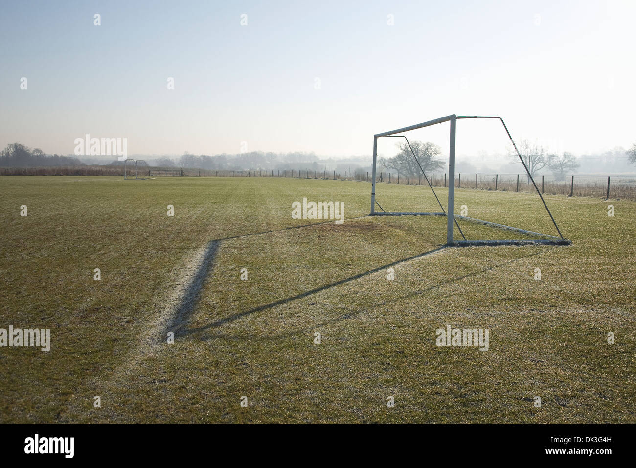 empty football pitch and goal on a frosty winter morning sunrise Stock ...
