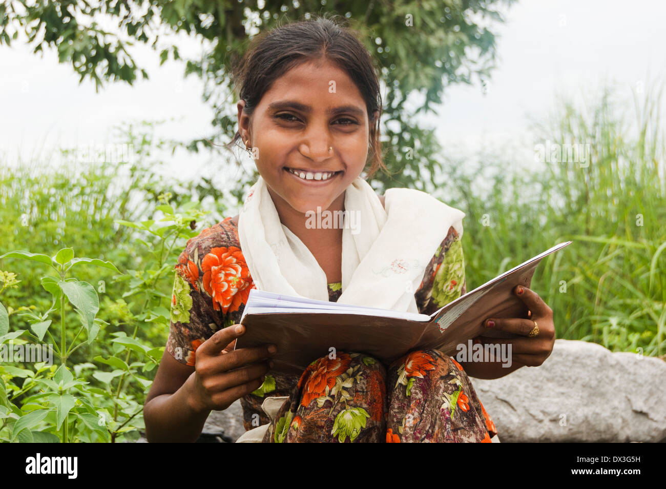 1 Indian Rural Kids Reading Book Stock Photo - Alamy