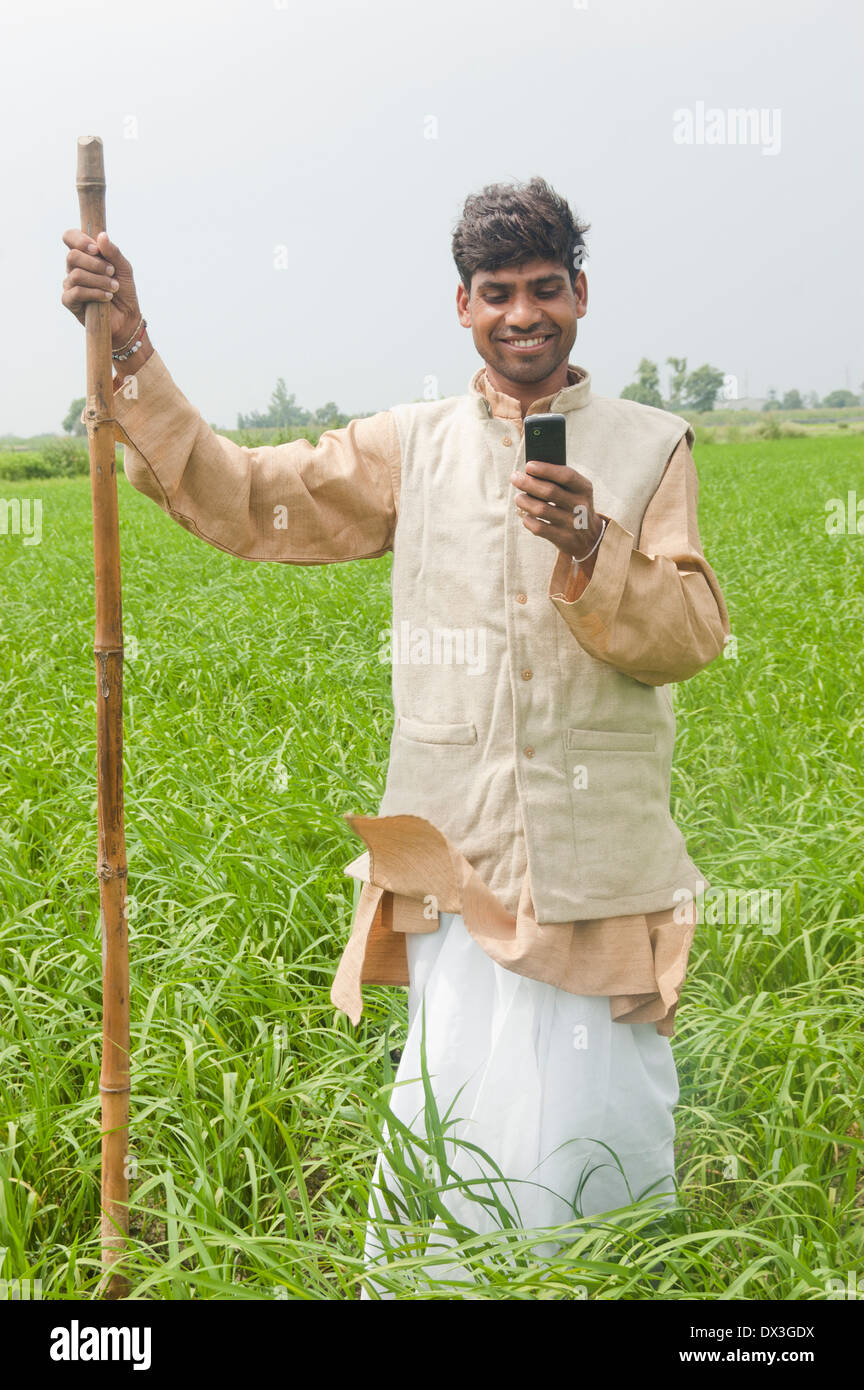 1 Indian Farmer Standing in Field Stock Photo - Alamy