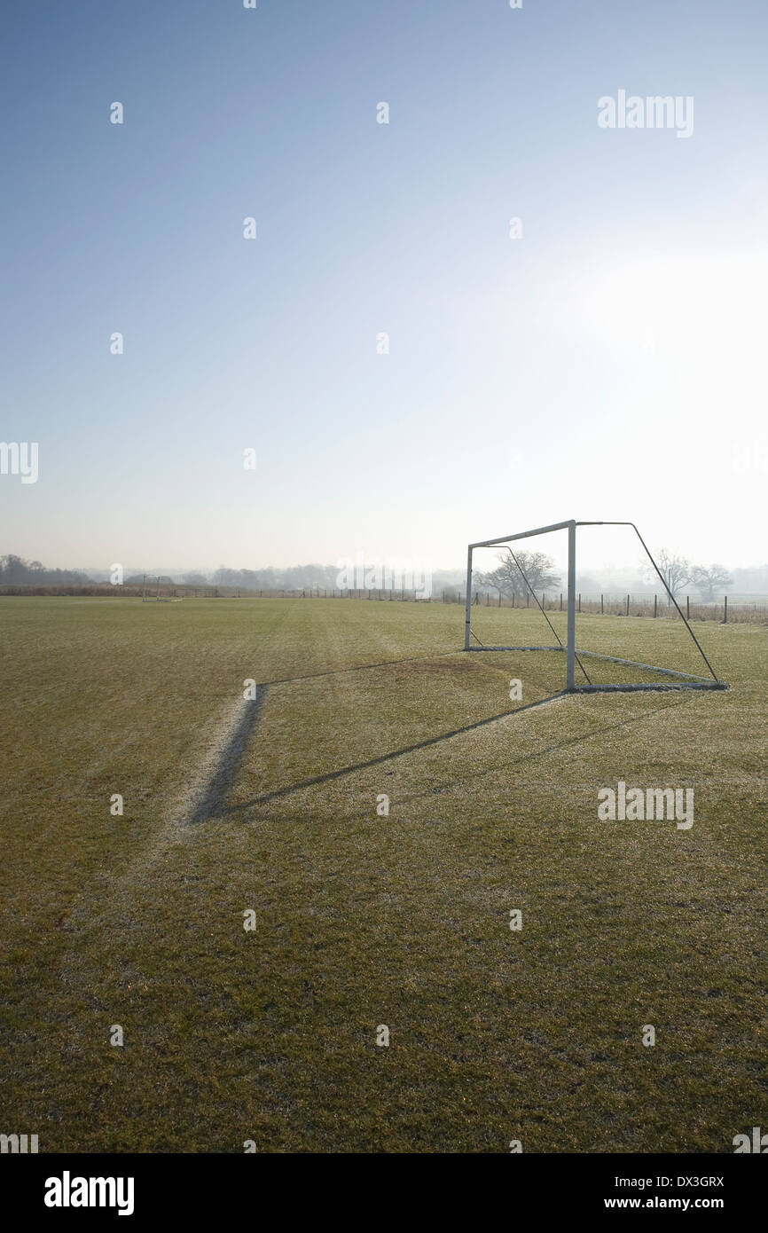 empty football pitch and goal on a frosty winter morning sunrise Stock ...