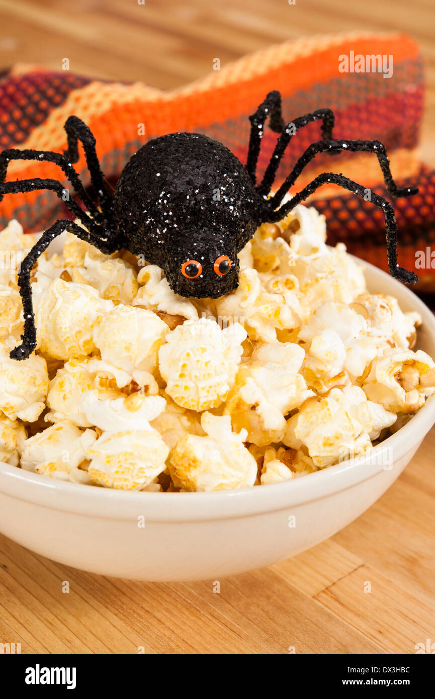 Halloween spider guarding a festive popcorn treat Stock Photo - Alamy