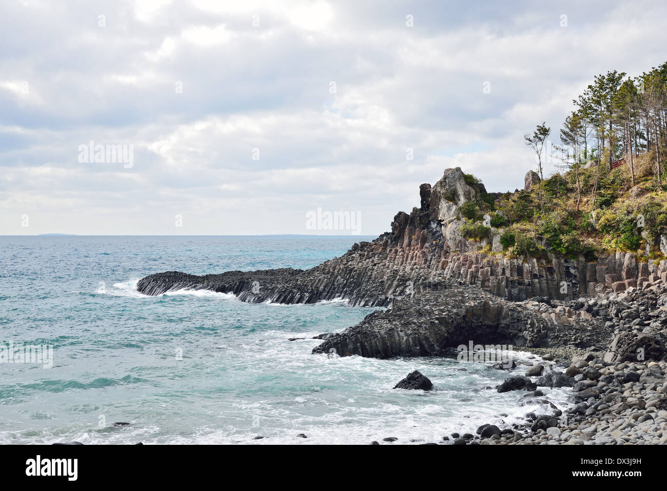 basaltic columnar joint coast in JungMun in Jeju Island Stock Photo - Alamy