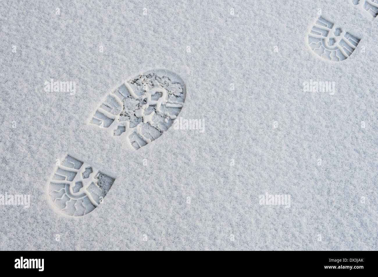 Footprints In Snow Stock Photo - Alamy
