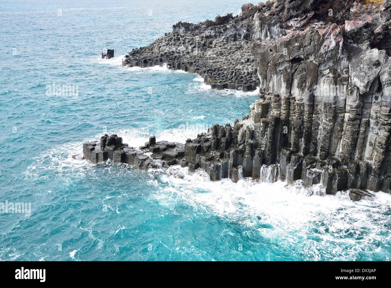 basaltic columnar joint coast in JungMun in Jeju Island Stock Photo - Alamy