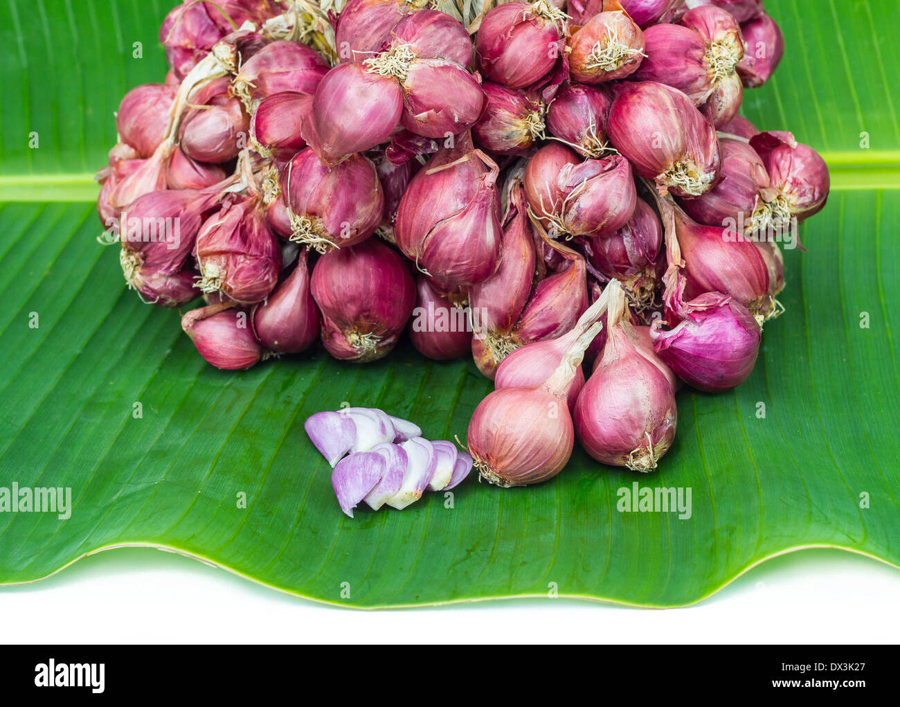 Shallot on banana leaf Stock Photo - Alamy