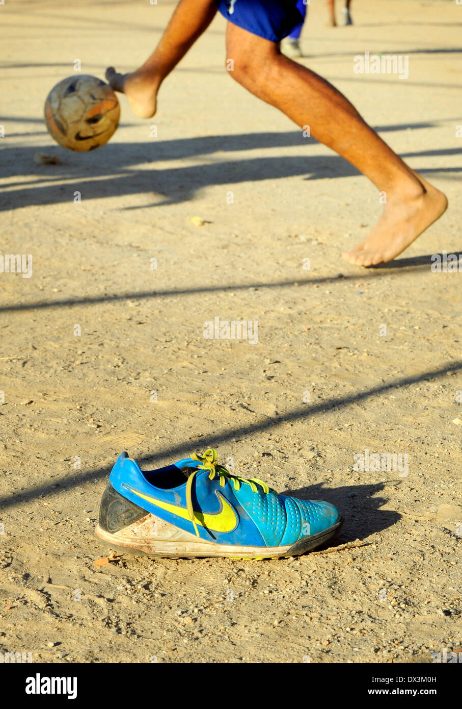RIO DE JANEIRO, BRAZIL - MARCH 17: Childrens playing soccer barefoot in ...