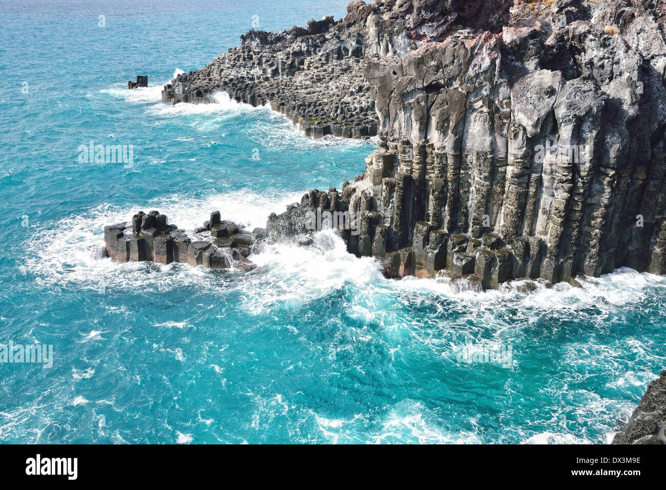 basaltic columnar joint coast in JungMun in Jeju Island Stock Photo - Alamy