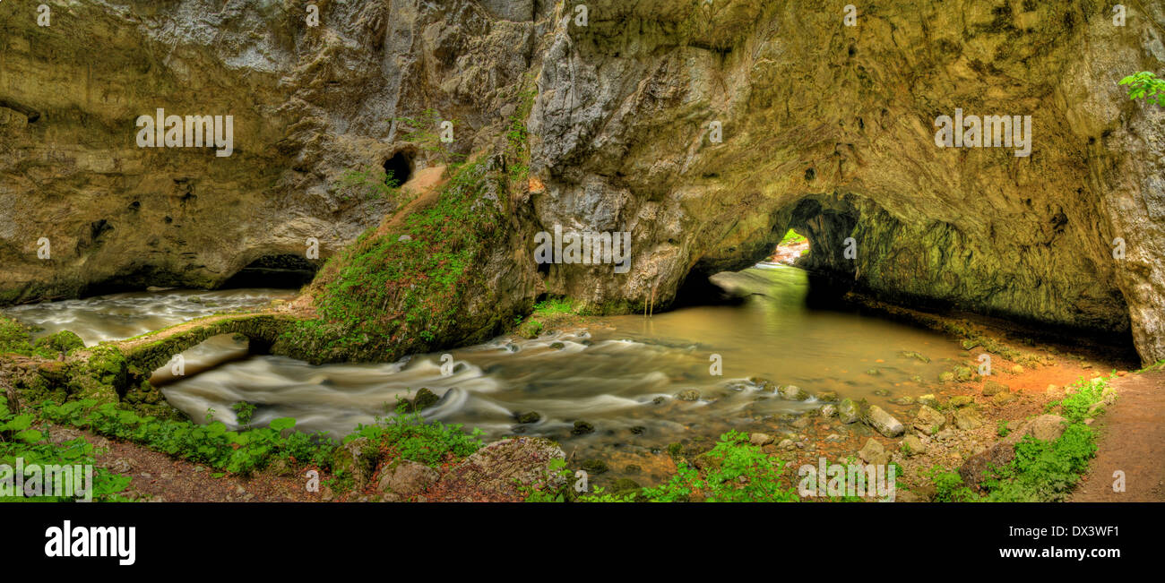 River flow through a cave on slovenian carst Stock Photo - Alamy